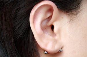 Piercing orecchio: tutte le tipologie. Tempi di guarigione, cura e foto