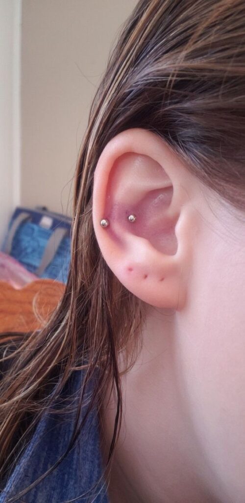 Piercing orecchio: tutte le tipologie. Tempi di guarigione, cura e foto