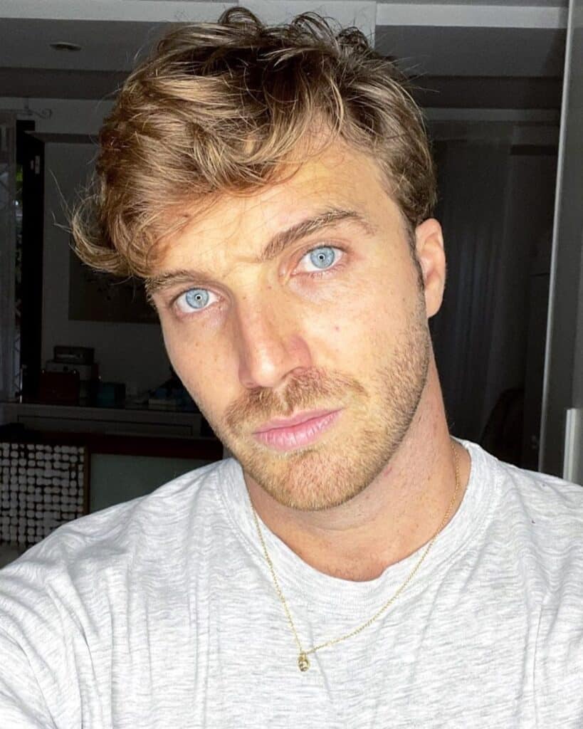 Paolo Ciavarro, nuovo look capelli e critiche: "Stai malissimo"